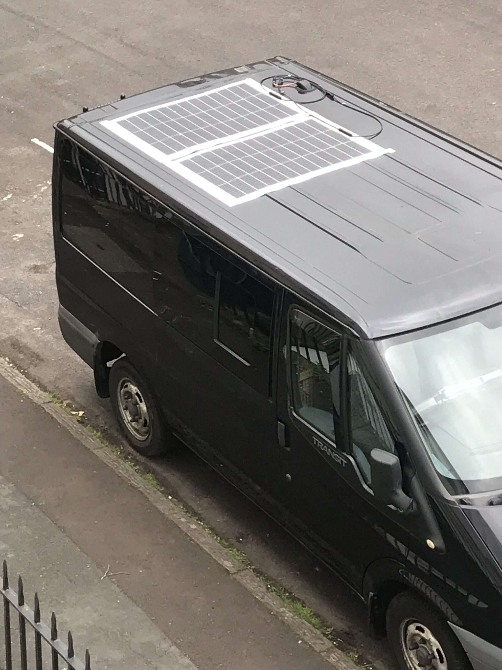 Cosmo the off-grid campervan - stylish black Ford Transit 2011 SWB ...