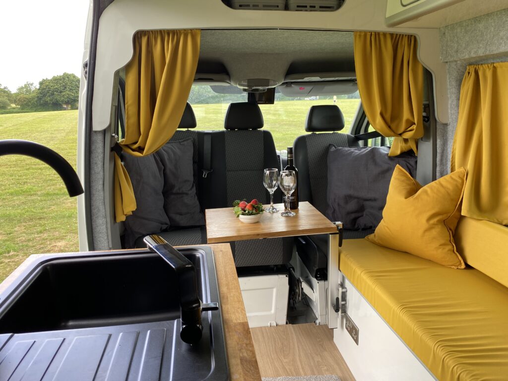 LWB VW Crafter conversion with fixed bed and 2 showers | Quirky Campers