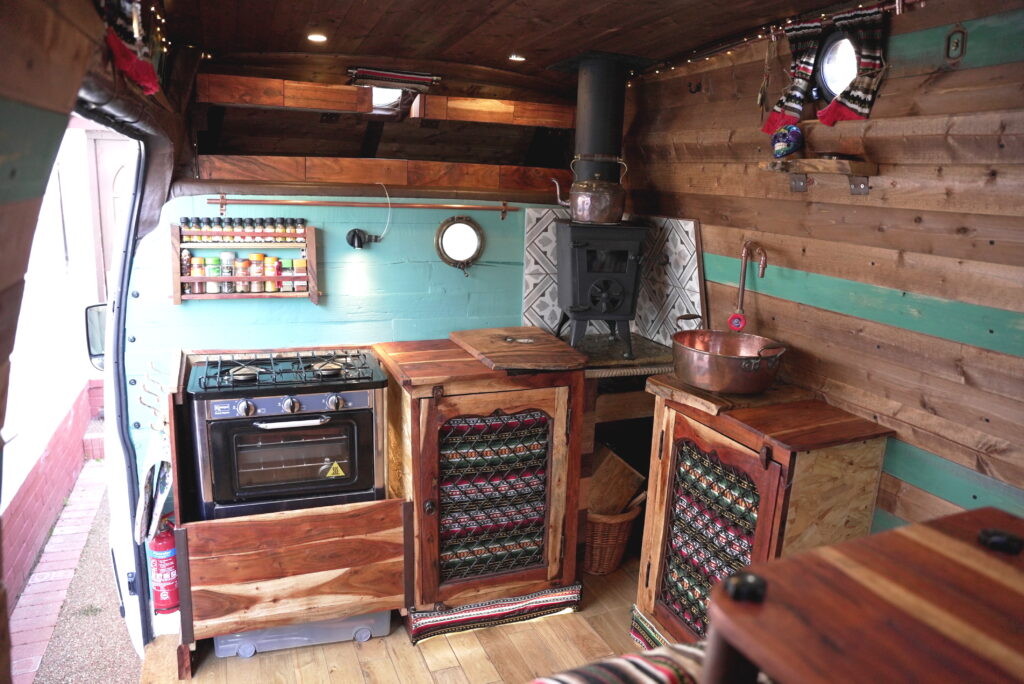 PIRATE: the rustic/ stealthy van with log burner O.N.O! | Quirky Campers