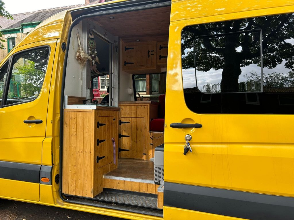 'Big Yellow' MWB Merc Sprinter with side flares | Quirky Campers