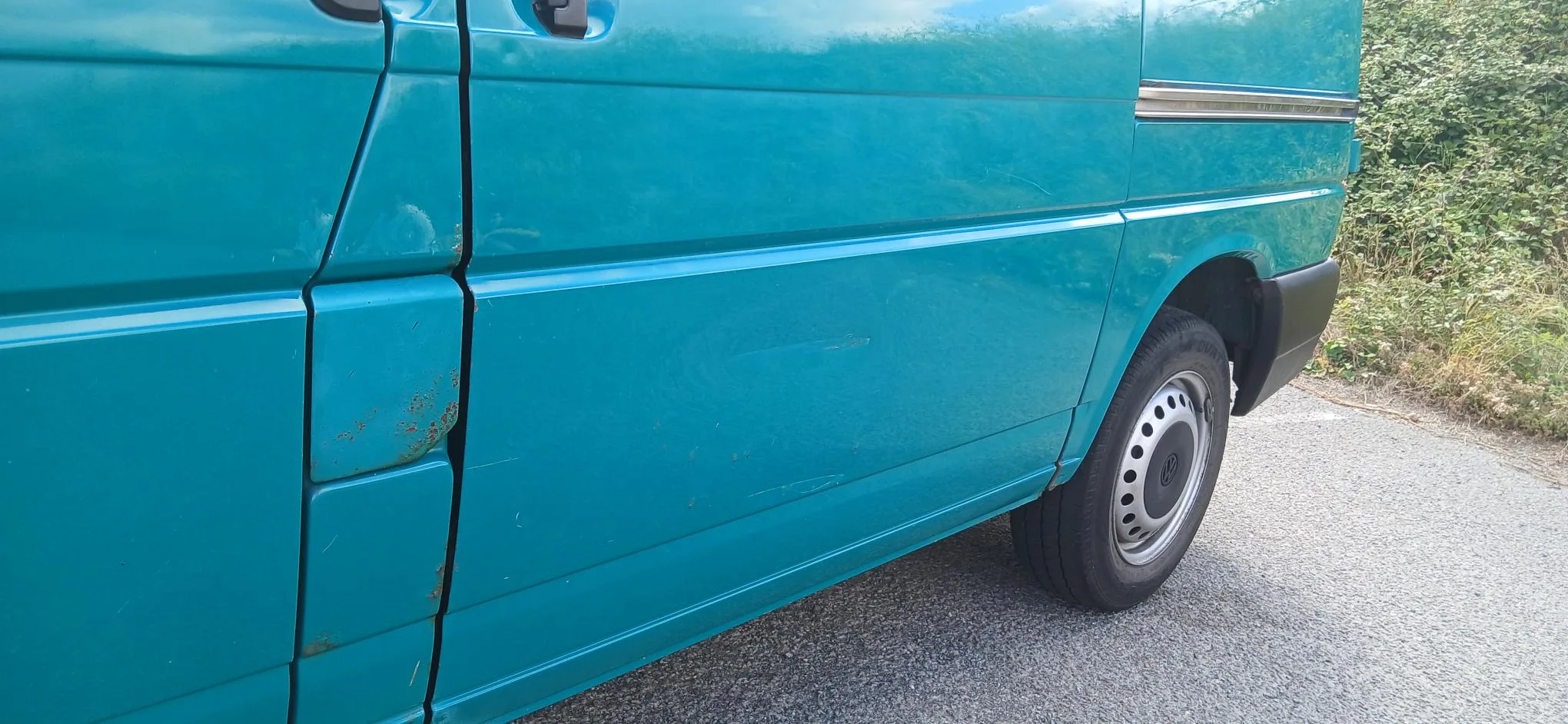 1997 VW T4 SWB 1.9d - seats and sleeps four | Quirky Campers